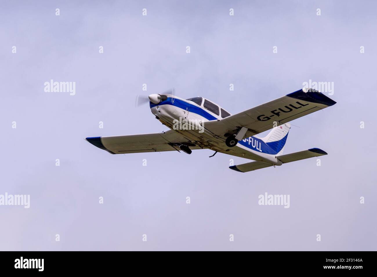Piper PA-28 Cherokee Arrow II G-FULL light aircraft plane taking off ...