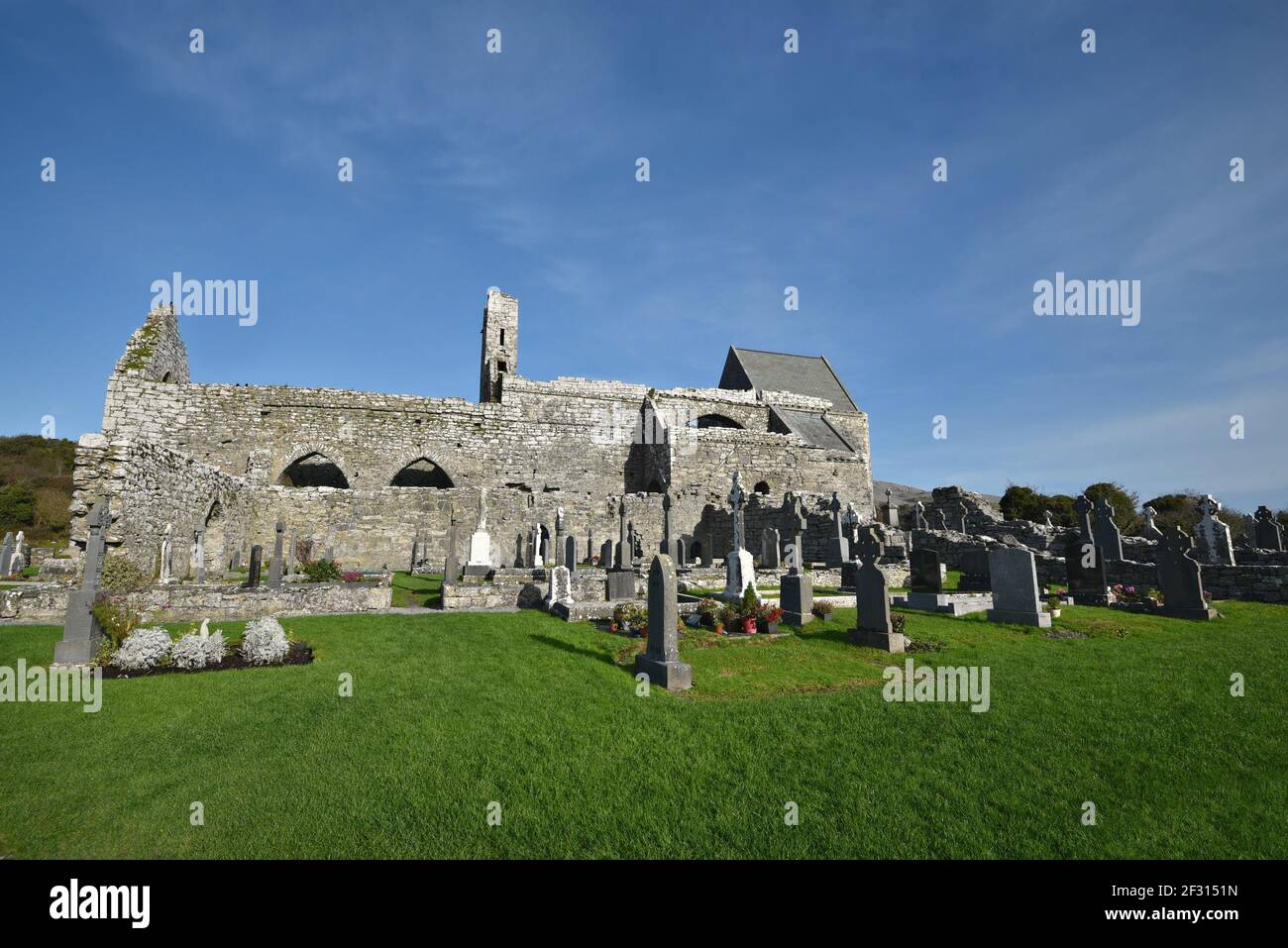 Irish landscape with panoramic view of Corcomroe Abbey, a historic ...
