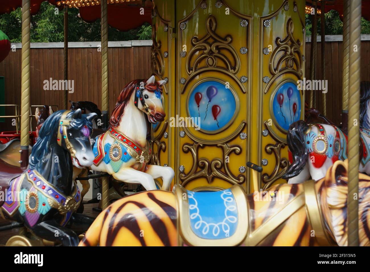 traditional horse ride carousel in a children's amusement park Stock ...