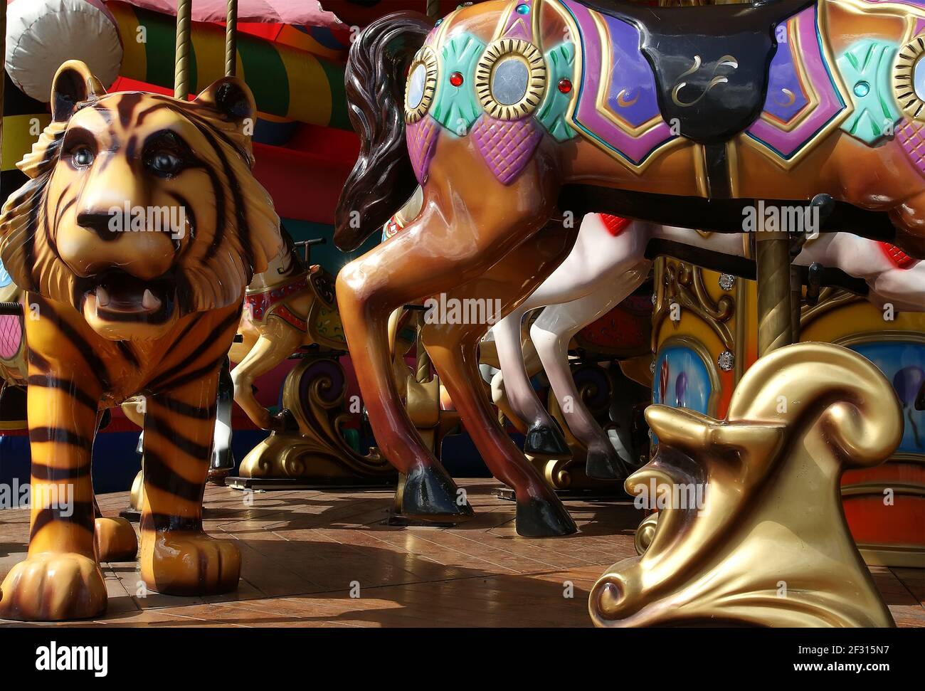 traditional horse ride carousel in a children's amusement park Stock ...