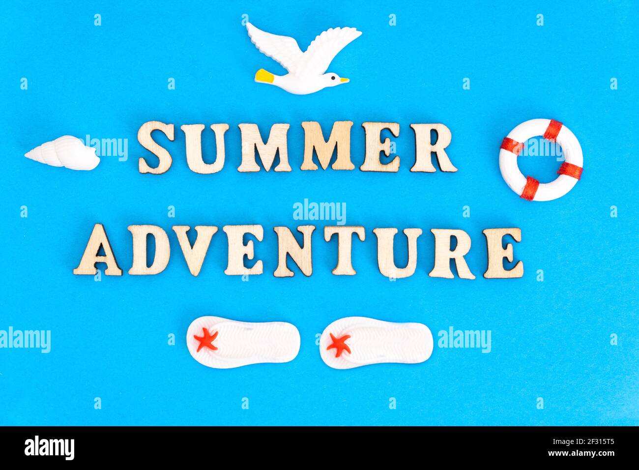 Creative summer vacation composition: lettering SUMMER ADVENTURE made ...