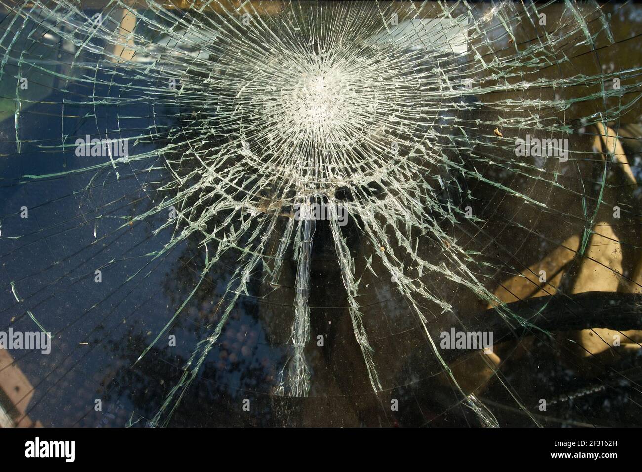 A dirty broken window pane in black and white Stock Photo - Alamy