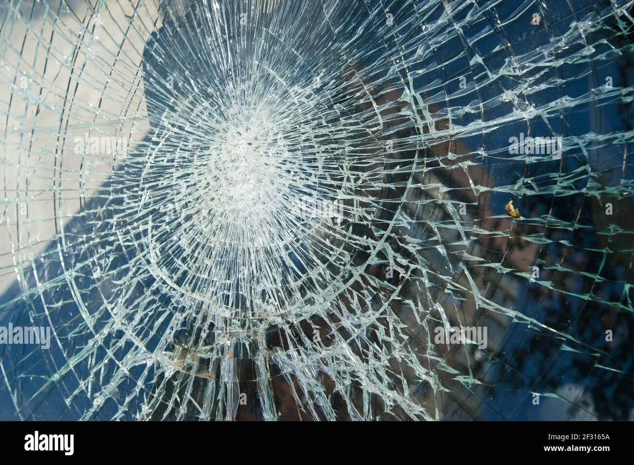 A dirty broken window pane in black and white Stock Photo - Alamy