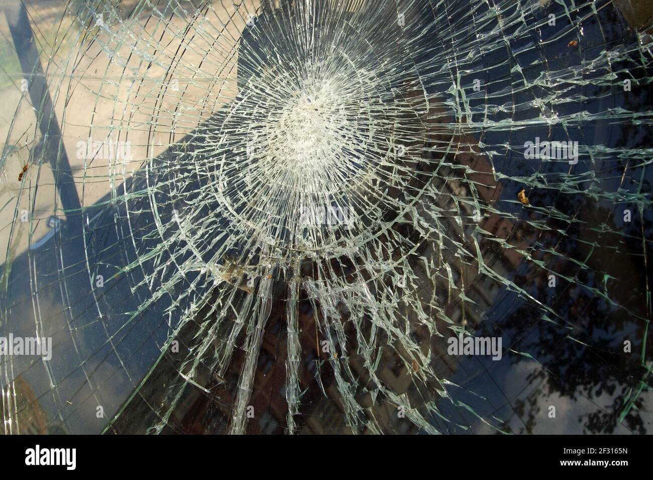 A dirty broken window pane in black and white Stock Photo - Alamy