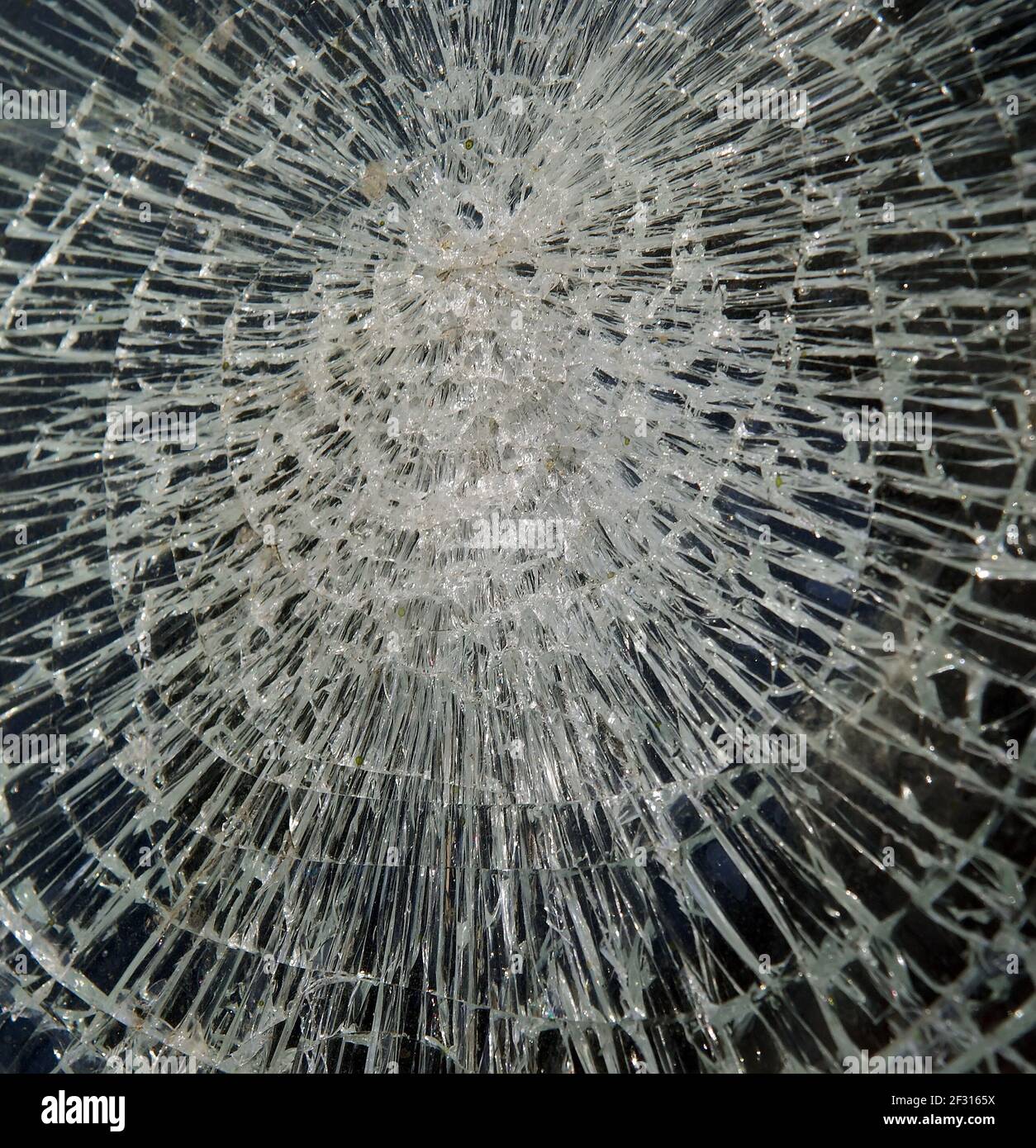 A dirty broken window pane in black and white Stock Photo - Alamy