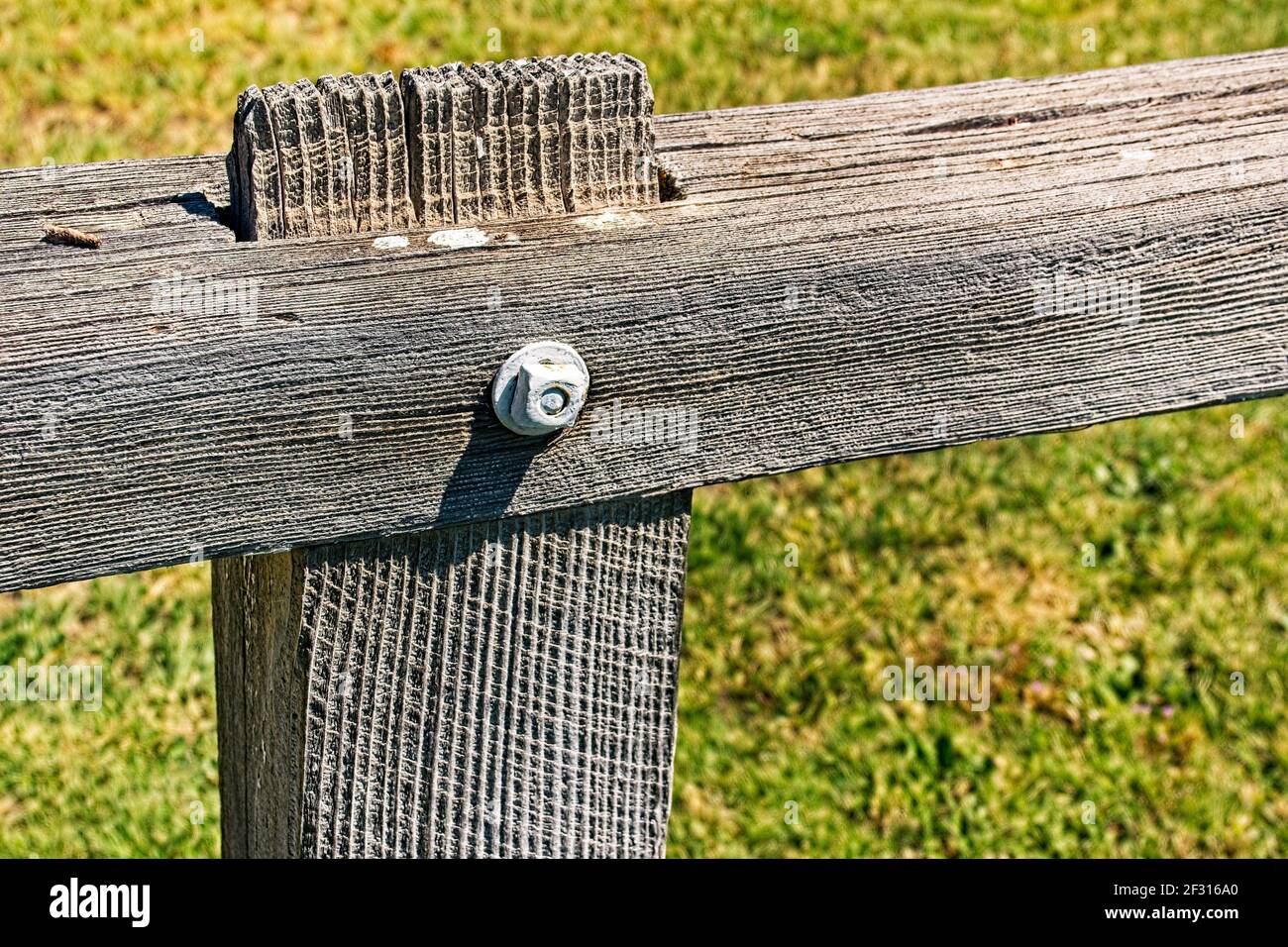 Weathered Fence A closeup of an old fence post and railing at the Bodie ...