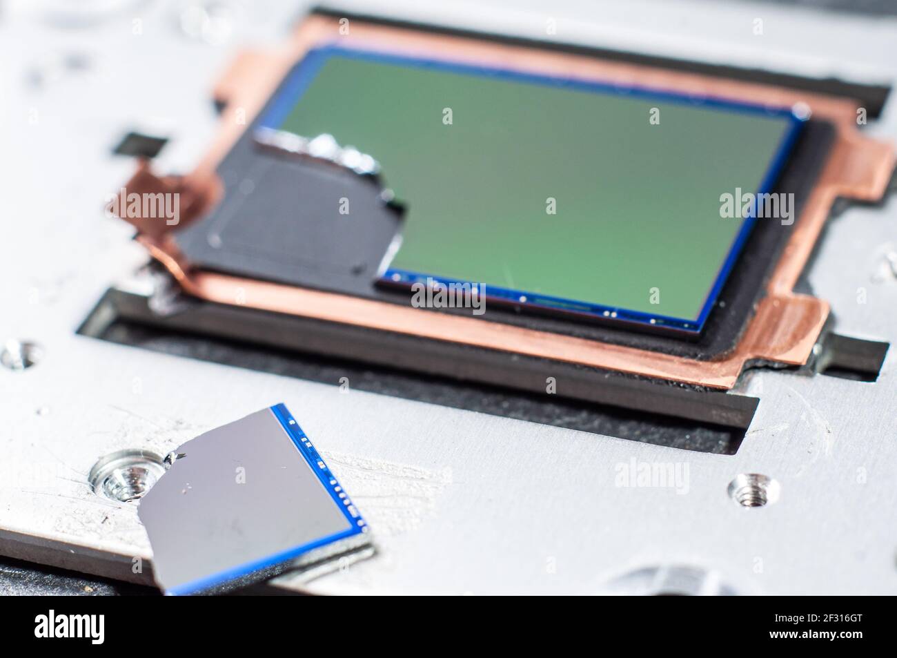 A crack in the camera matrix, close-up of a chipped piece of the ...