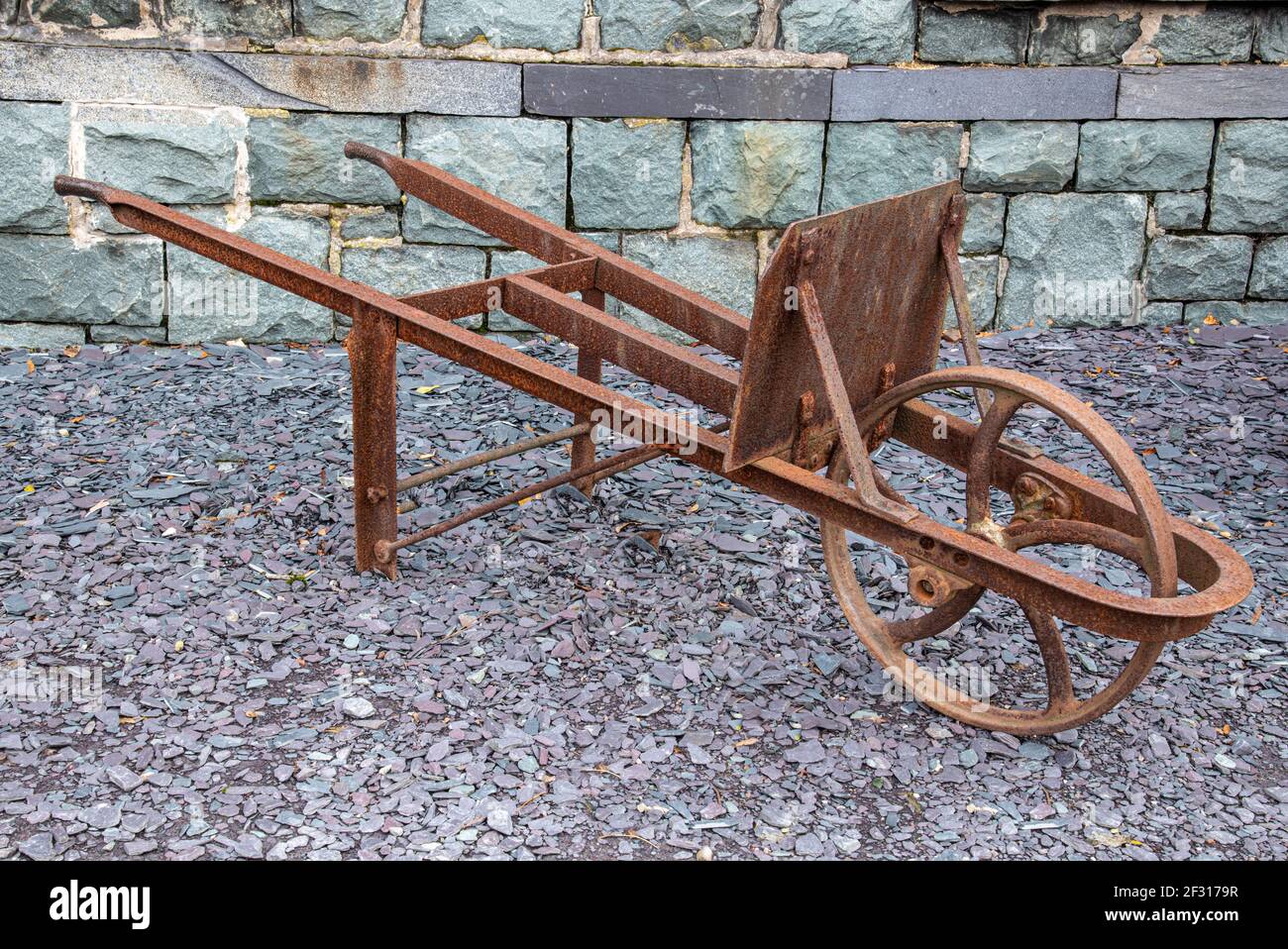 Vintage iron slate barrow 5312 Stock Photo - Alamy