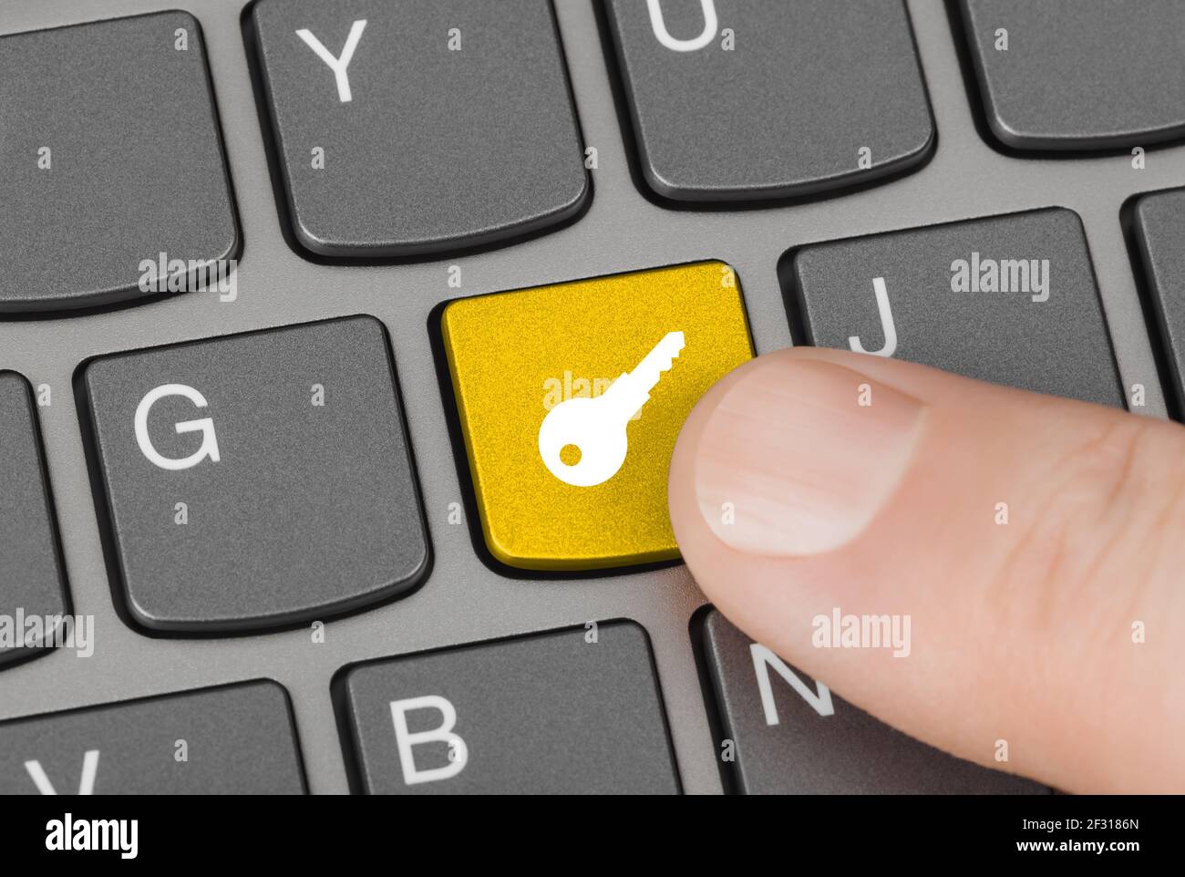 Computer keyboard with security key Stock Photo - Alamy
