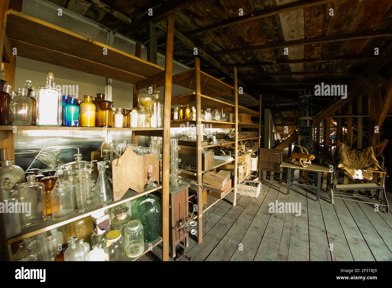ancient attic with selves full of old things Stock Photo - Alamy