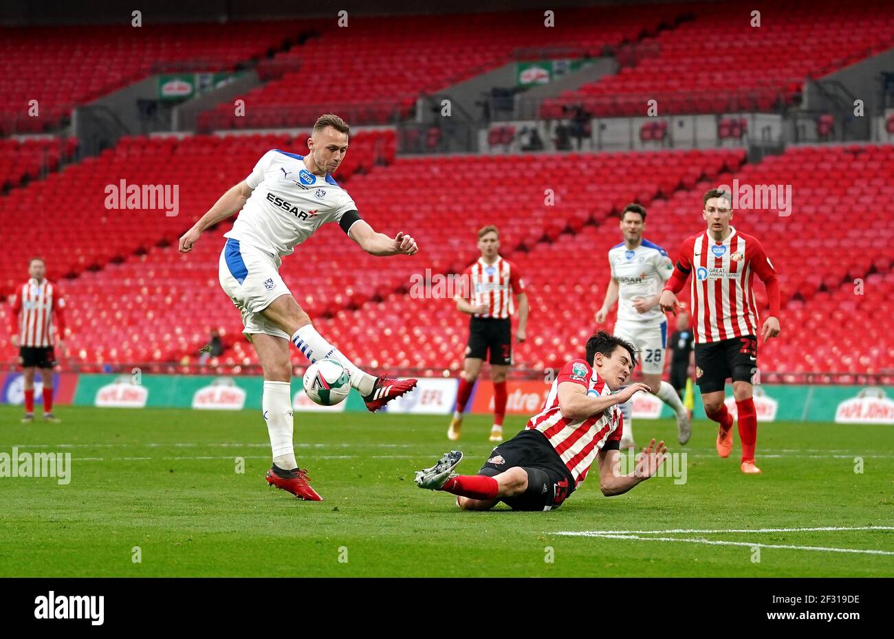 Tranmere Rovers' George Ray (left) has his shot blocked by Sunderland's ...