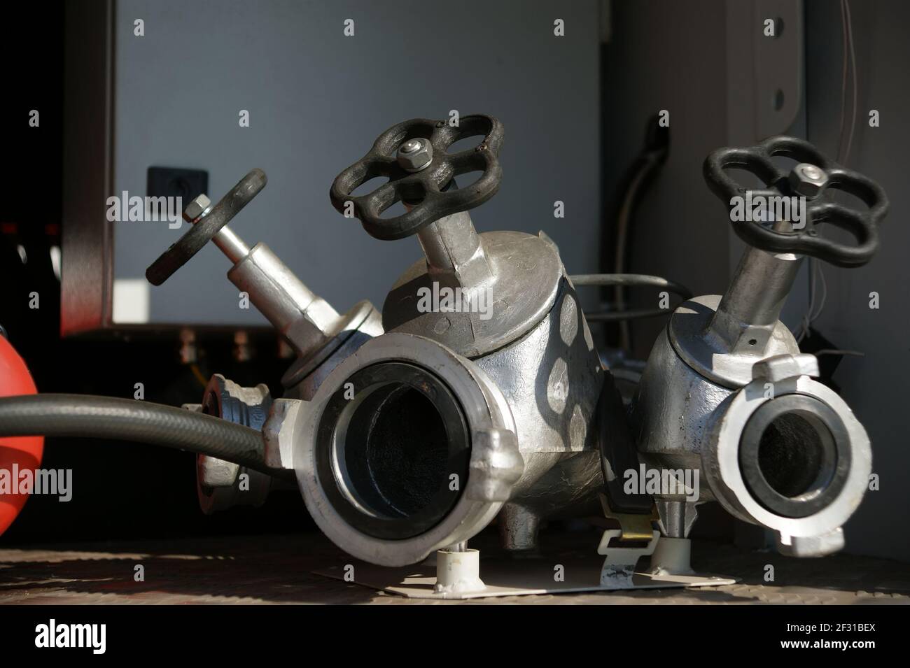 Connector for fire hose in the fire truck Stock Photo - Alamy