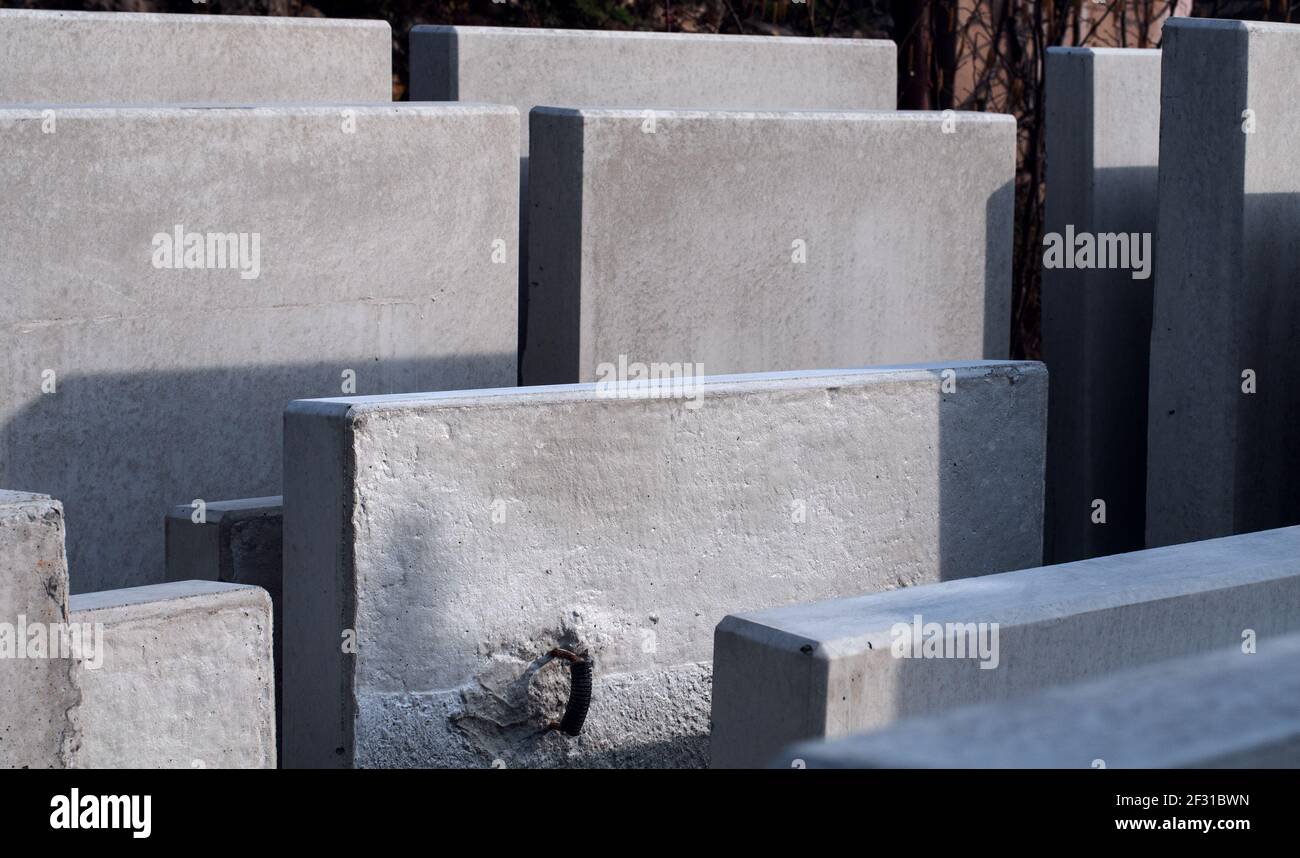 gray cement blocks stored at a construction site in sunlight Stock ...