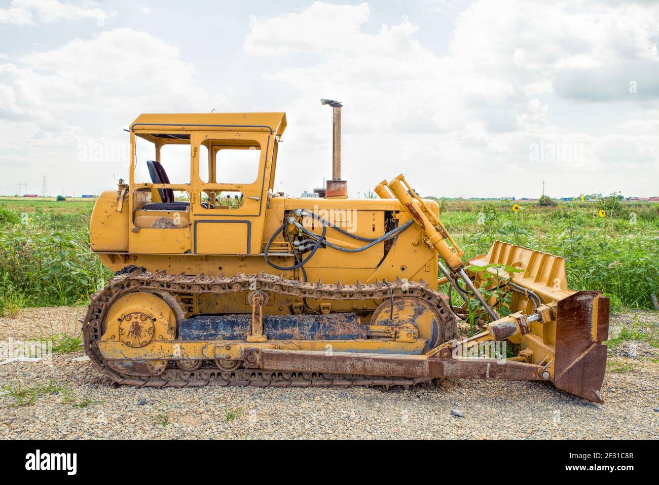 Old Rusty Industrial construction equipment Bulldozer excavator loader ...