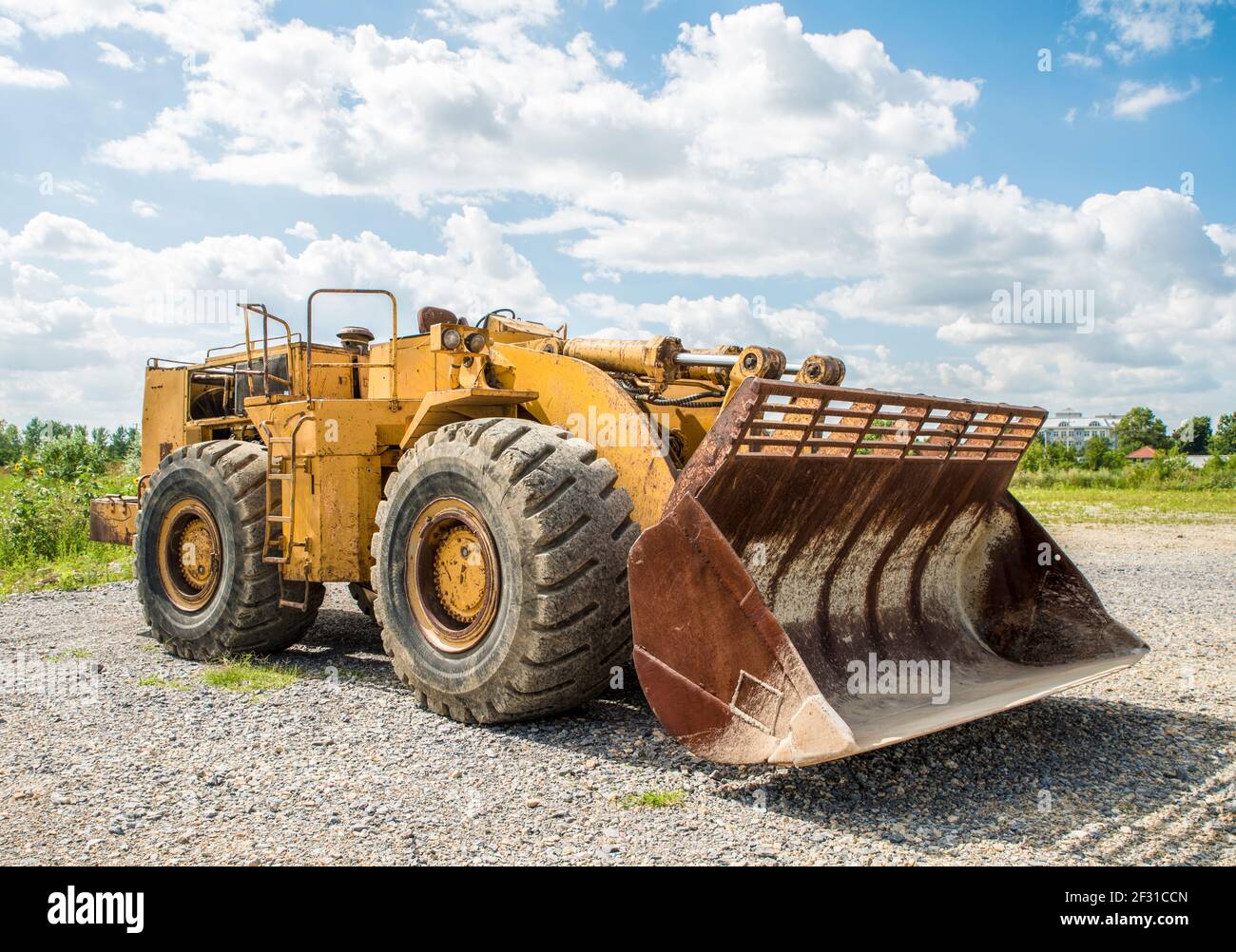 Old Rusty Industrial construction equipment Bulldozer excavator loader ...