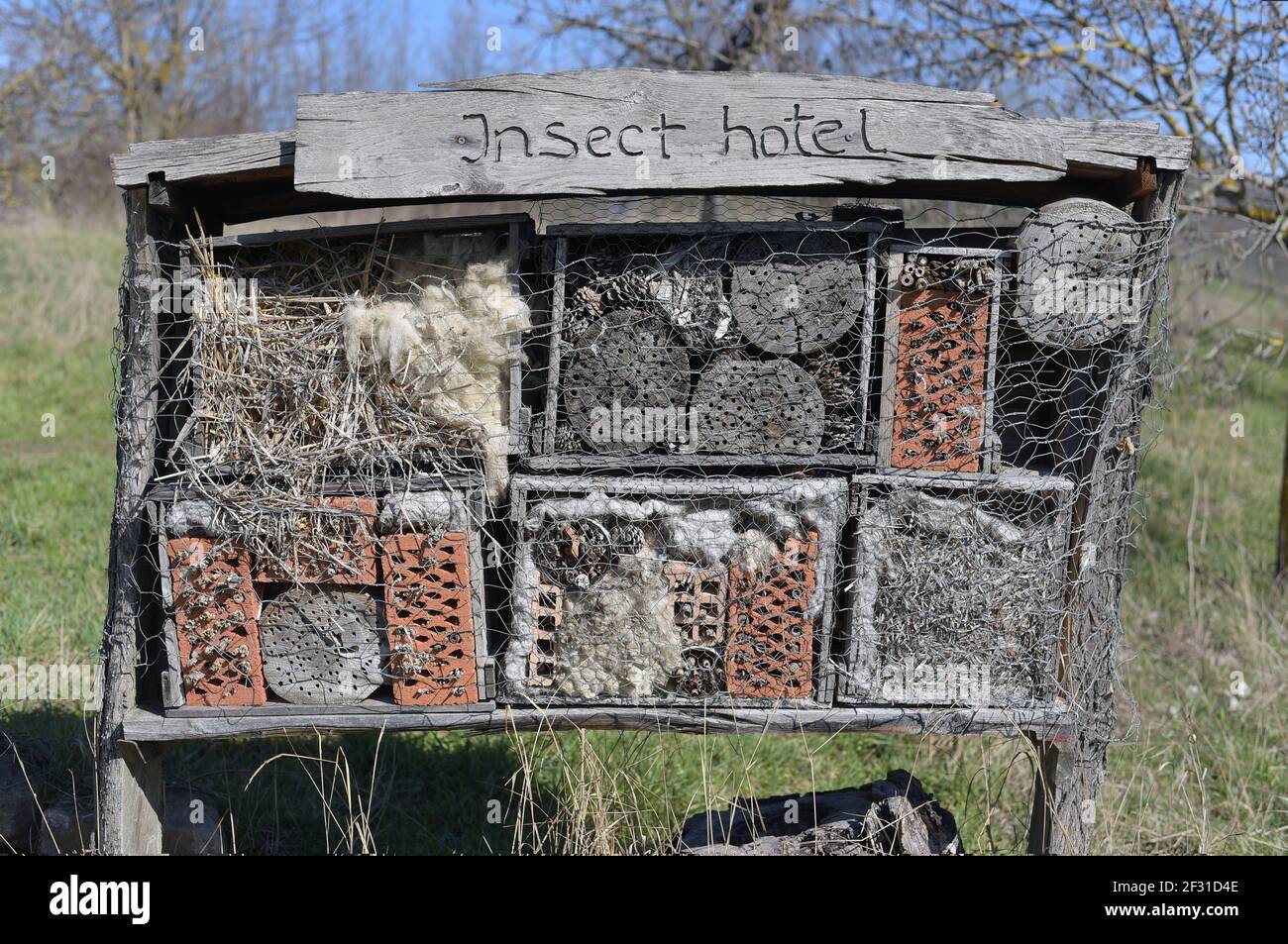 A nest for a variety of insect made of different materials on a warm ...