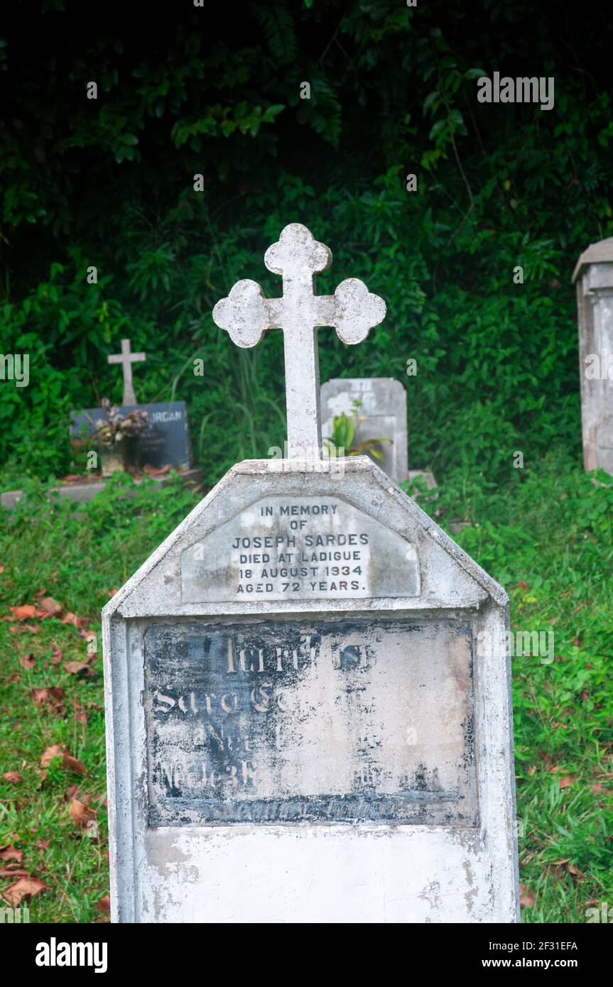 Seychelles, La Digue Island, Tropical new Cemetery in La Passe. View of ...
