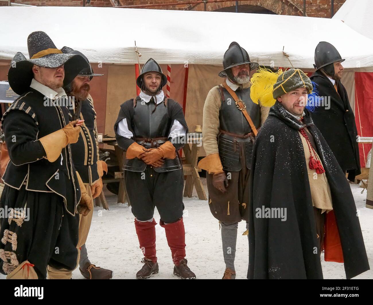 Historical reenactors in costumes of 17th century European mercenaries ...