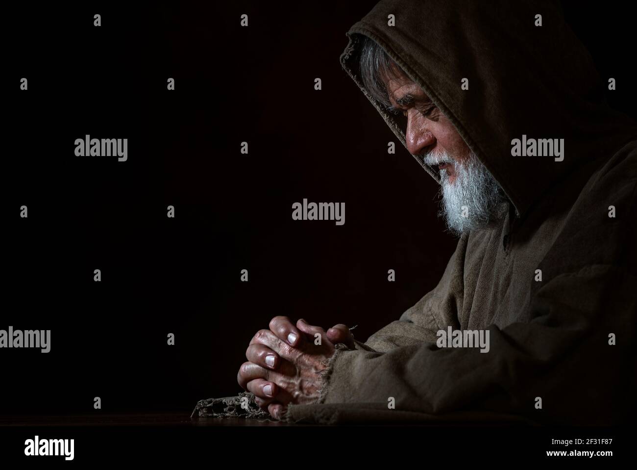 Medieval monk in prayer hi-res stock photography and images - Alamy