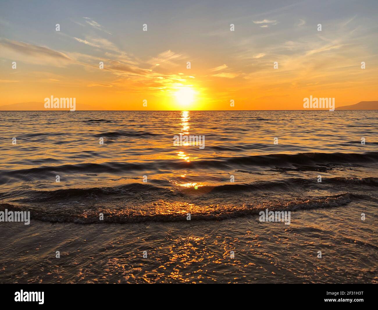 Sunset and seascape landscape background Stock Photo - Alamy