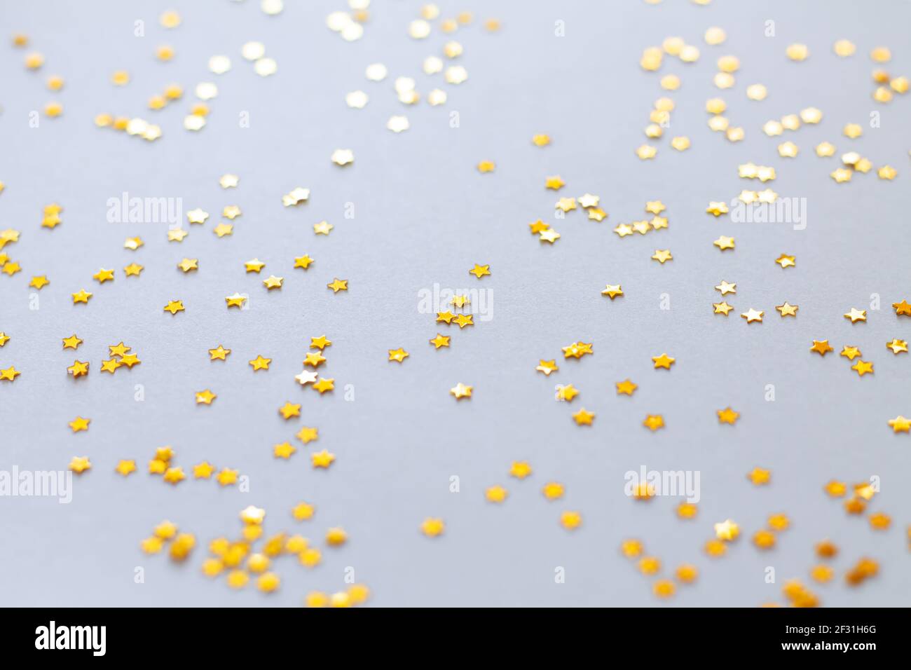 Shiny gold star small stars hi-res stock photography and images - Alamy