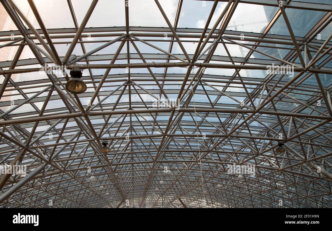 Glass roof with metal structure in perspective Stock Photo - Alamy