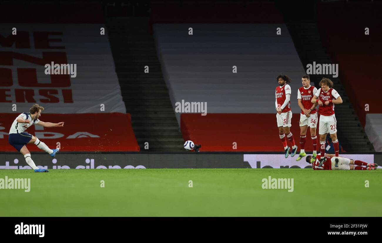 Tottenham Hotspur's Harry Kane takes a free-kick that hits the post ...