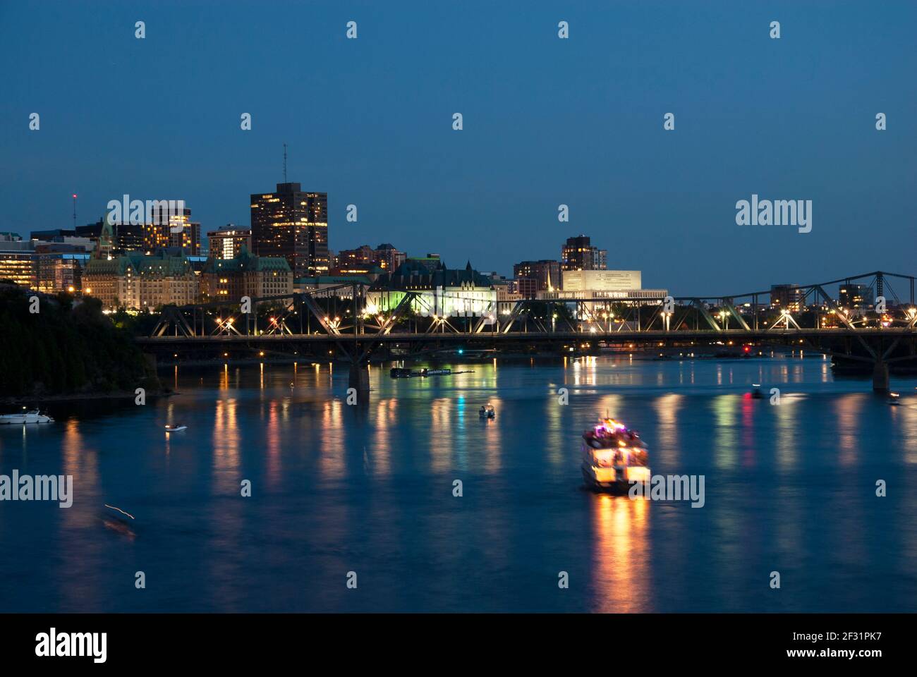 Skyline with Alexandra Bridge and Tour Boat on the Ottawa River at ...