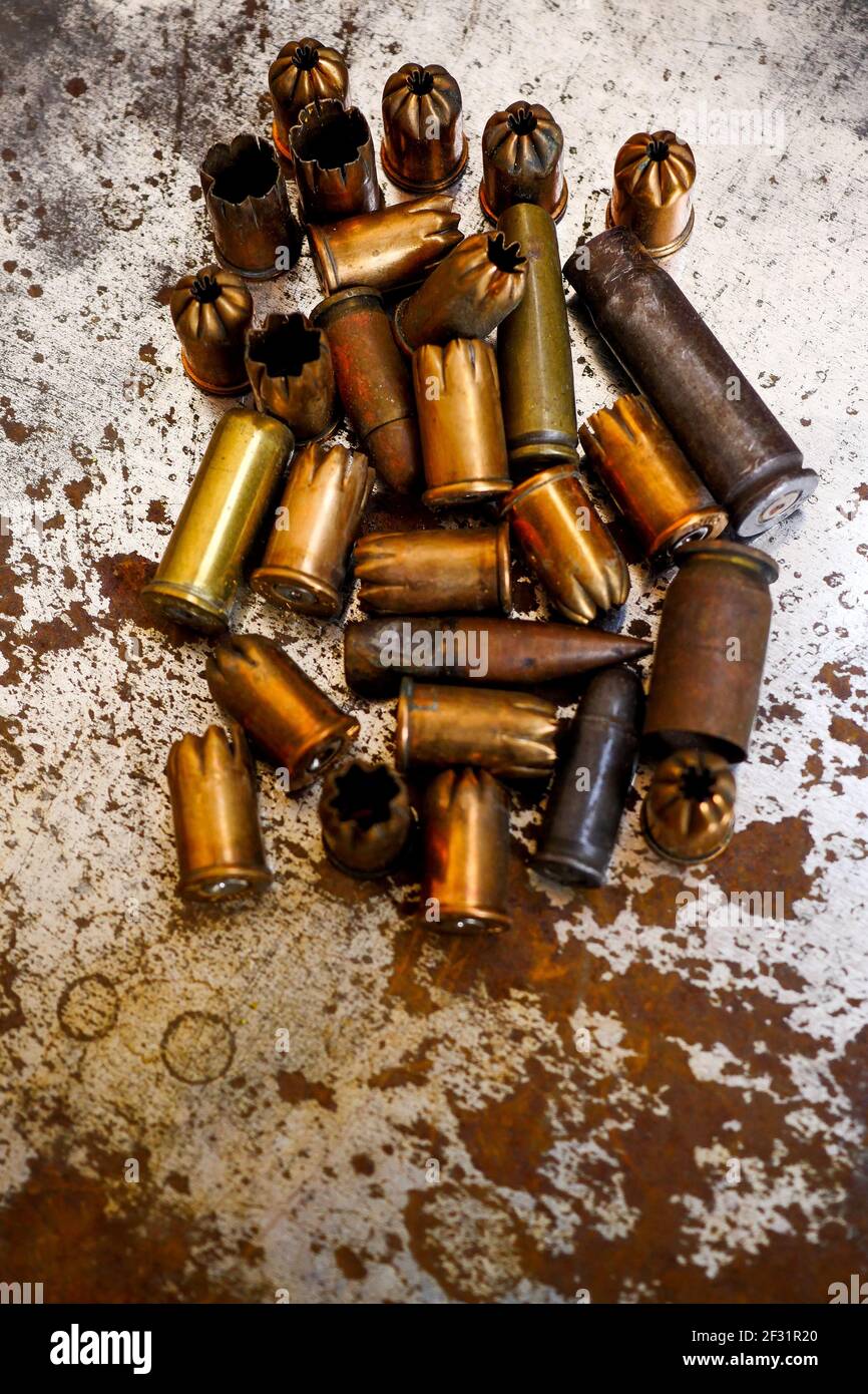 Mixed used gun bullets and cartridges, France Stock Photo - Alamy