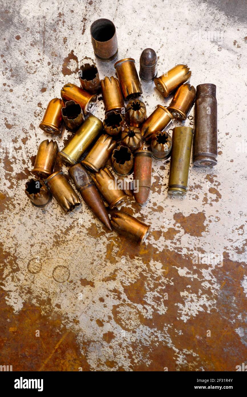 Mixed used gun bullets and cartridges, France Stock Photo - Alamy