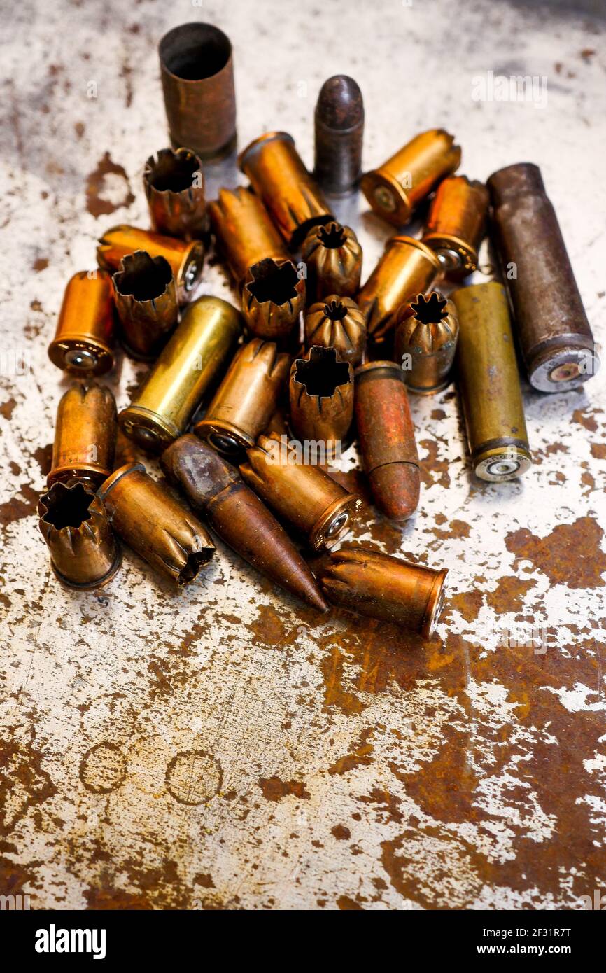 Mixed used gun bullets and cartridges, France Stock Photo - Alamy