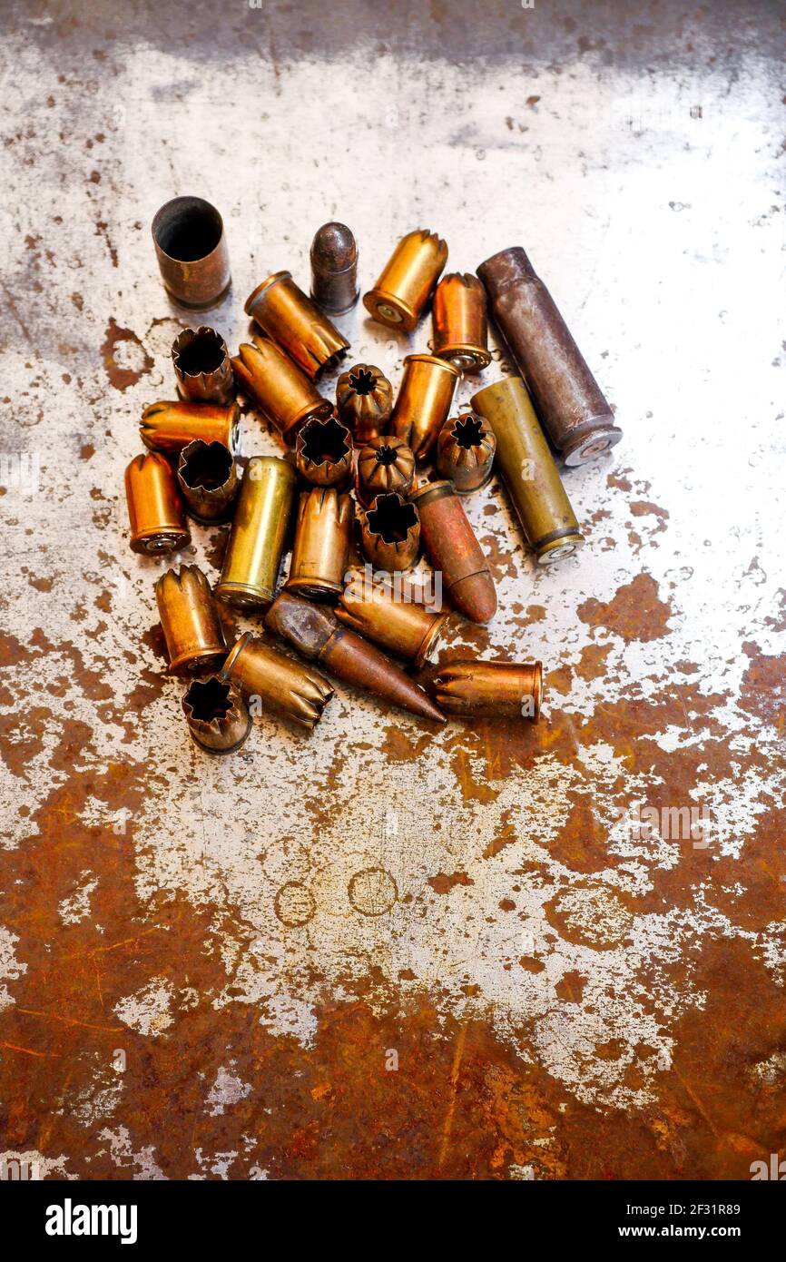 Mixed used gun bullets and cartridges, France Stock Photo - Alamy