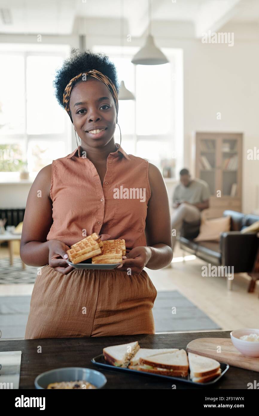 Woman waffles looking at camera hi-res stock photography and images - Alamy