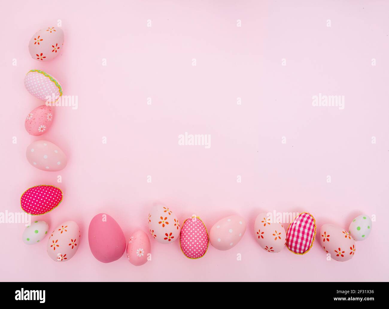 Happy Easter greeting card template. Easter eggs frame on pink pastel ...