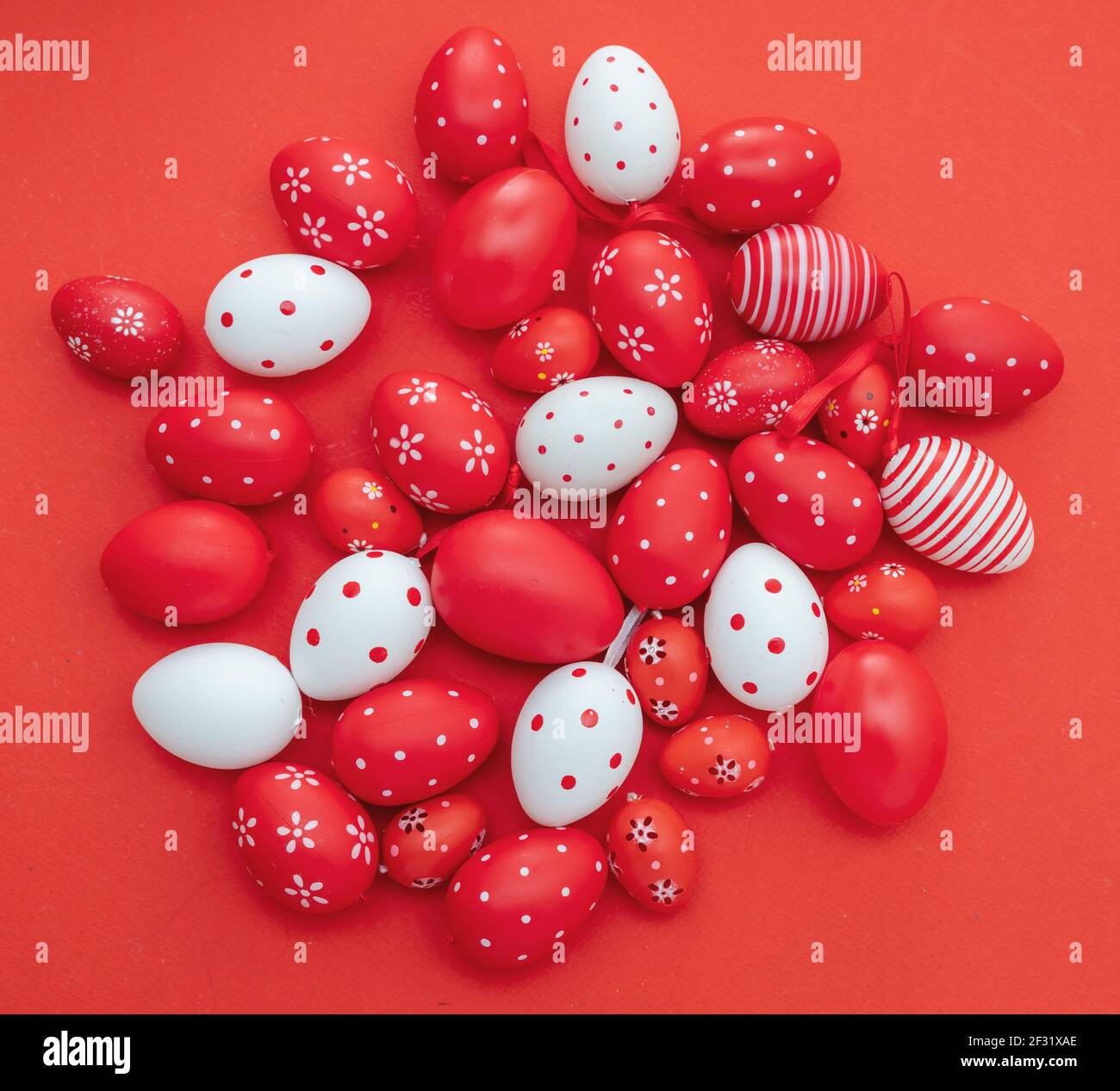 Easter eggs collection red and white color round shape on red ...