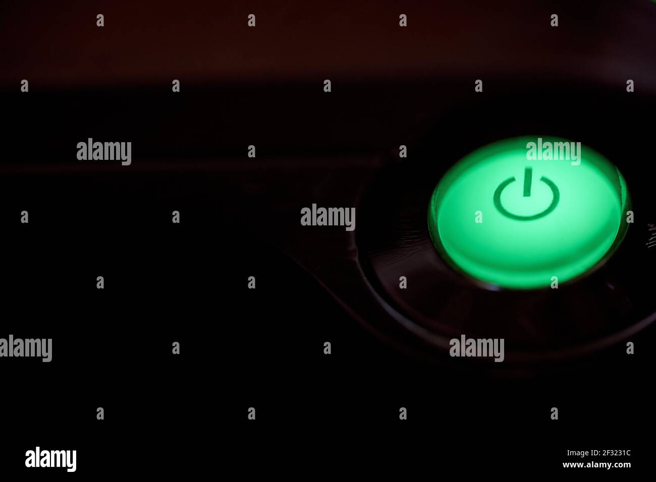 Cdznzofzcz green light button with sign turning on the computer. High ...