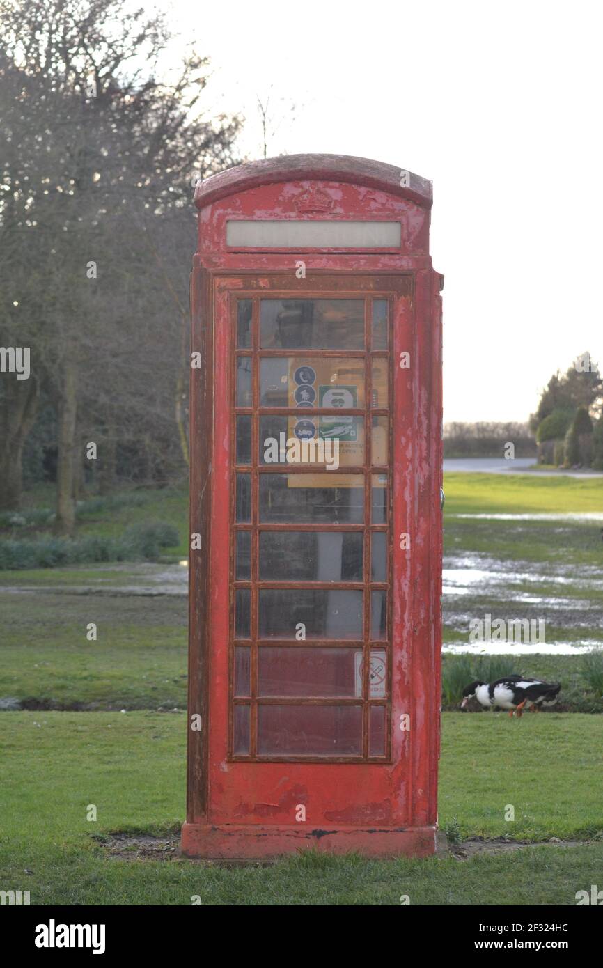 Old Red Telephone Box On A Village Green Reused For Defibrillator ...