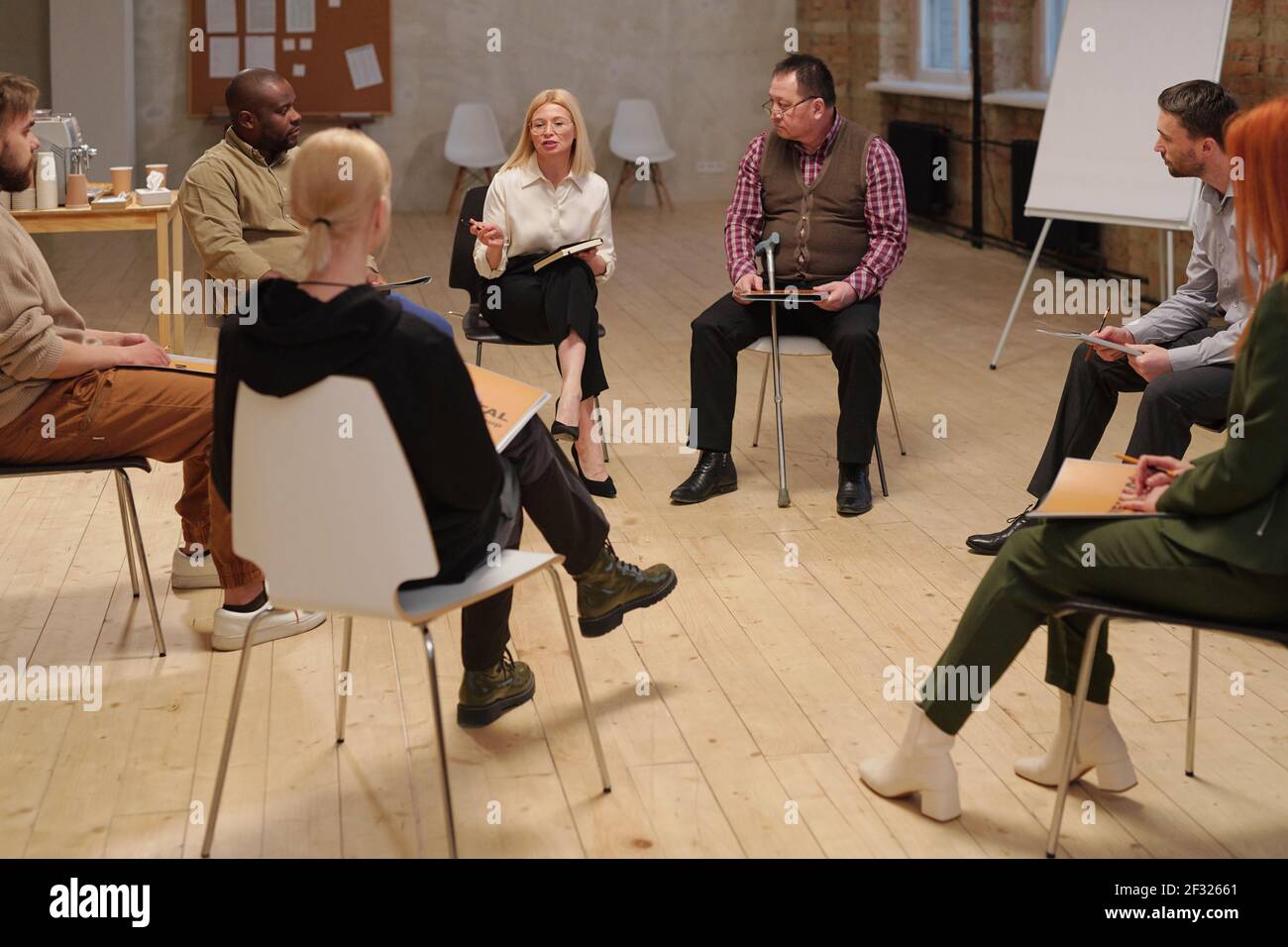 Women Groups Sitting In Chair