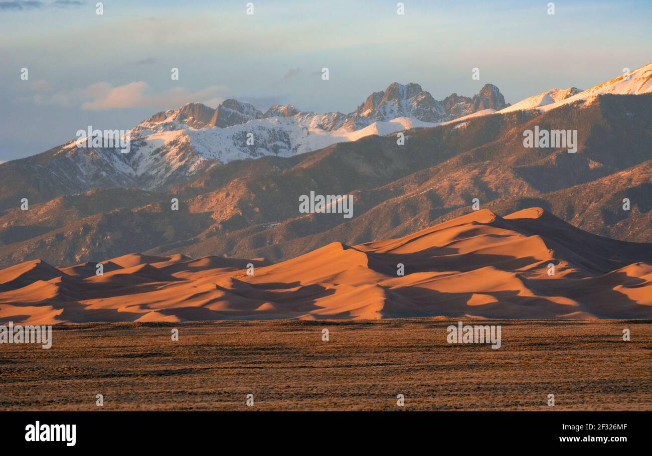 Snow on the Sangre de Cristo Mountains with Star Dune in front at the ...