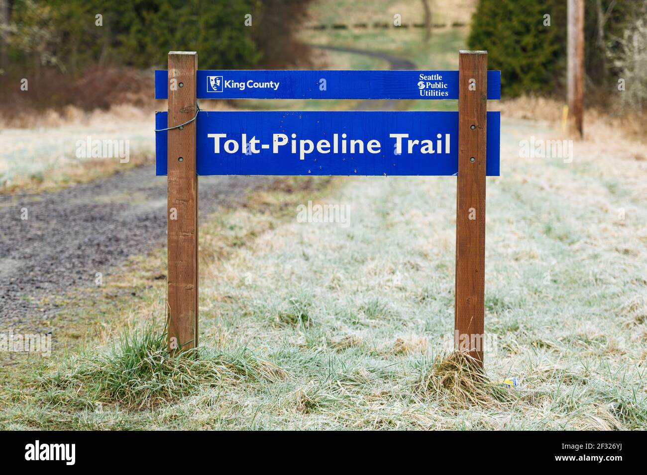 Blue and white King County signage for Tolt-Pipeline Trail along Kelly ...