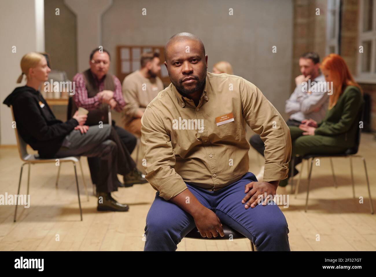 Serious bald multi ethnic man hi-res stock photography and images - Alamy