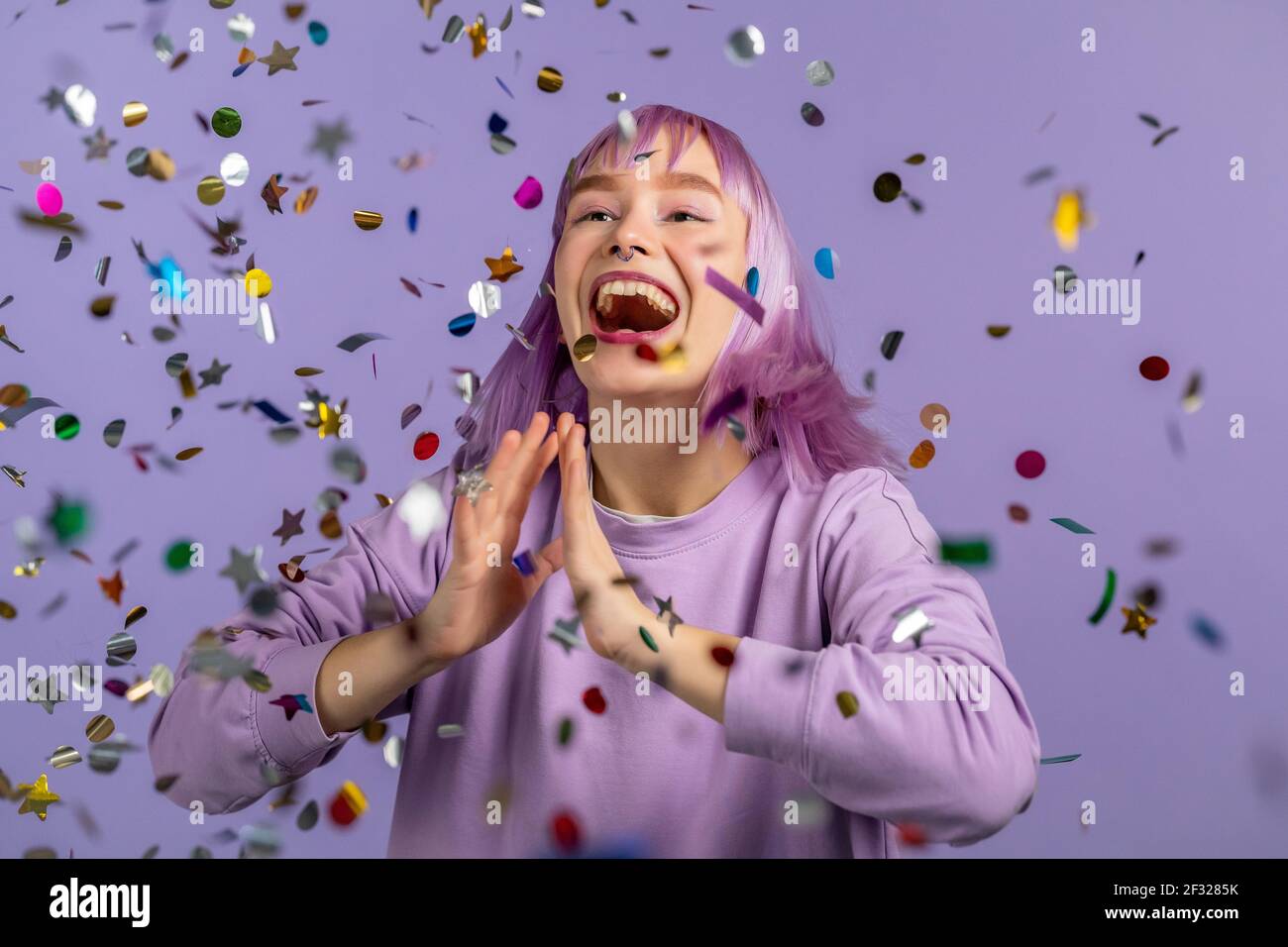 Excited unique woman clapping hands, having fun, screaming WOW ...