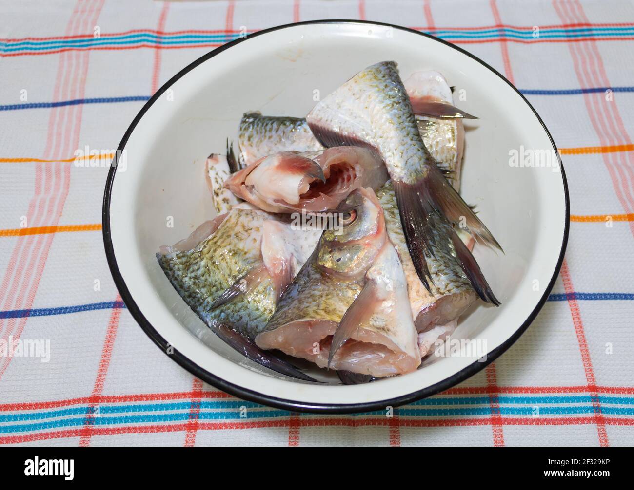 Freh sliced raw fish ready for cooking Stock Photo - Alamy
