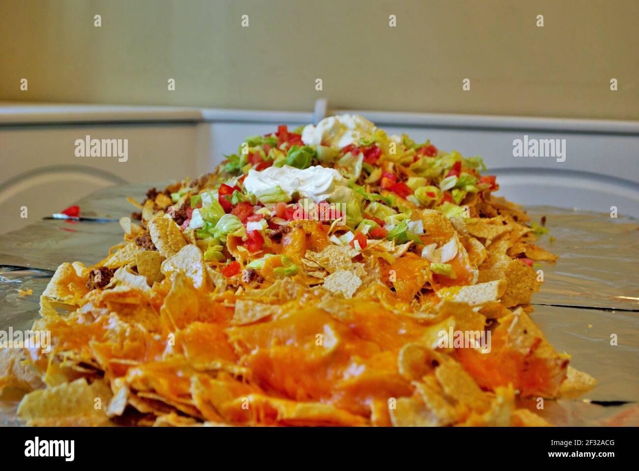 Nacho table kitchen table wrapped in aluminum foil and covered with ...