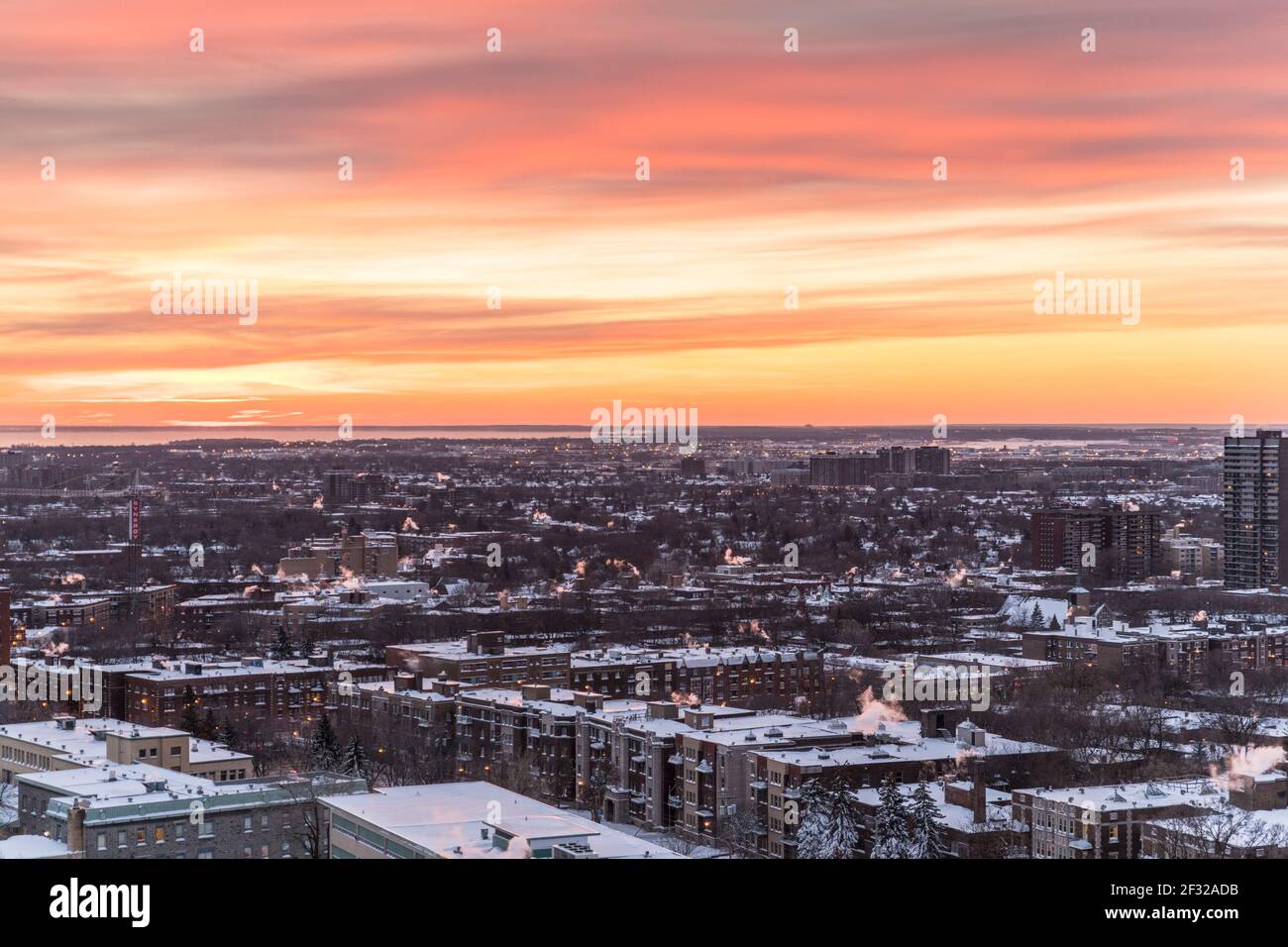 Dramatic sunset sky over the Western part of the island of Montreal in ...