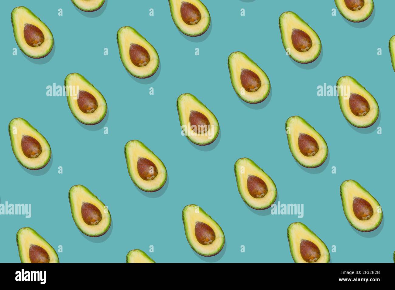 Trendy avocado pattern on a green background. Top view. Pop art minimal ...