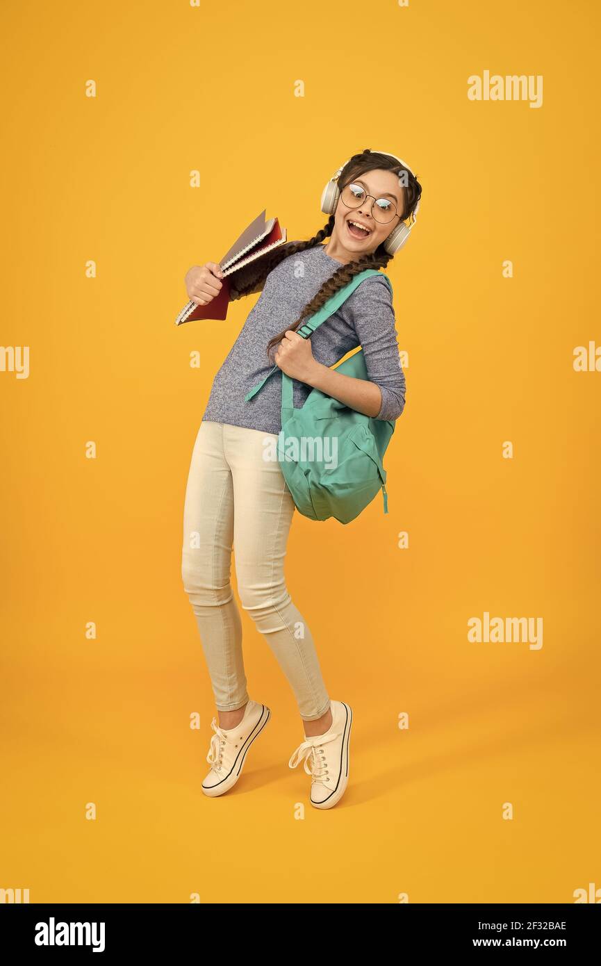 Feel the impact. Regular school day. Stylish schoolgirl. Girl carry ...