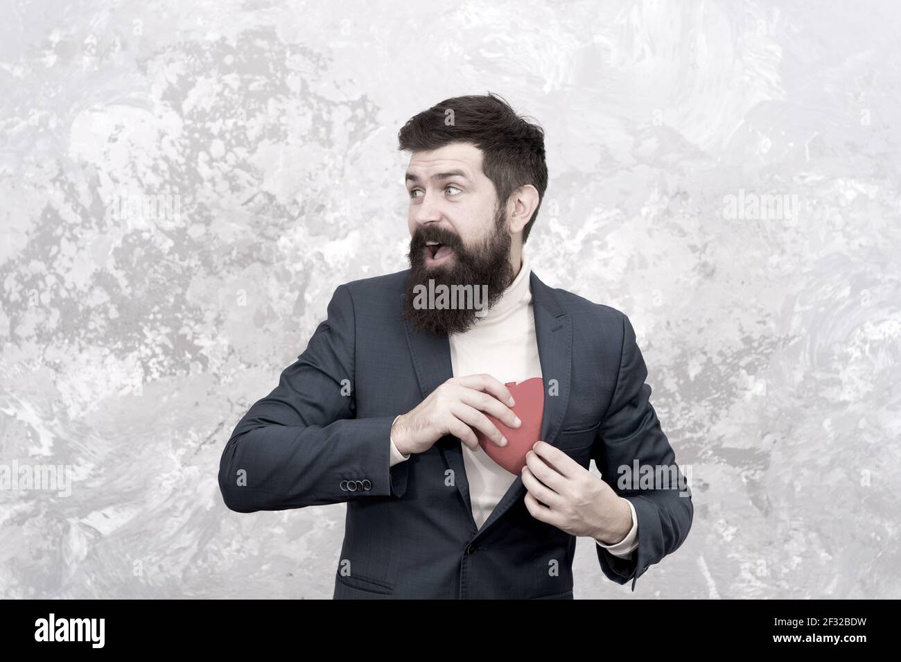 Greedy man hiding feelings. Feast of Saint Valentine. Handsome ...