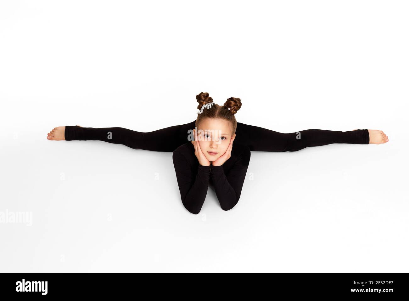 child girl sitting on a transverse twine Stock Photo - Alamy