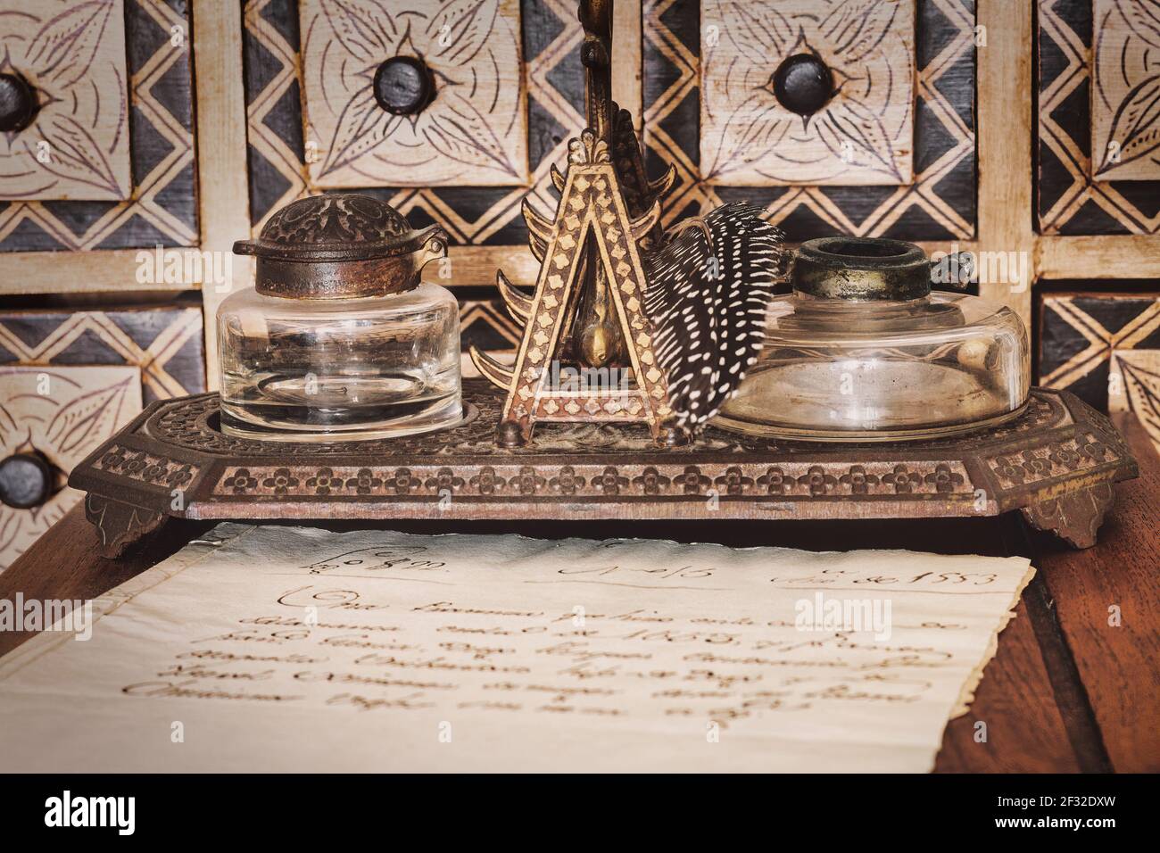 Very old inkwell next to original 16th century manuscript Stock Photo ...